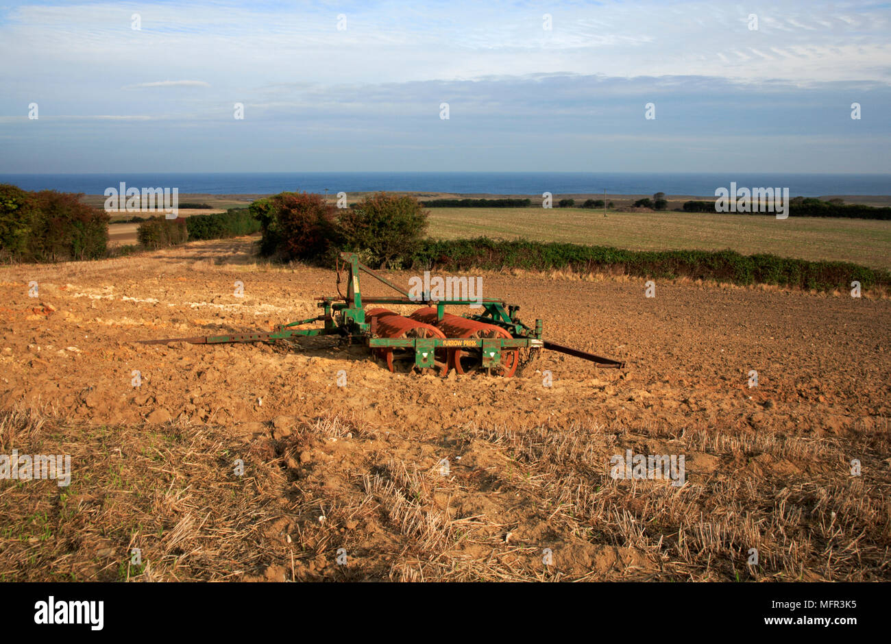 A furrow press left in a North Norfolk field after preparing arable ...