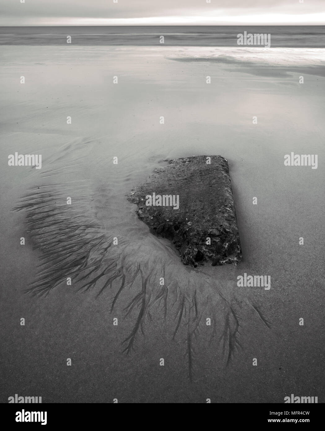 Patterns in the sand shaped by the tide on the beach in Aberdeen ...