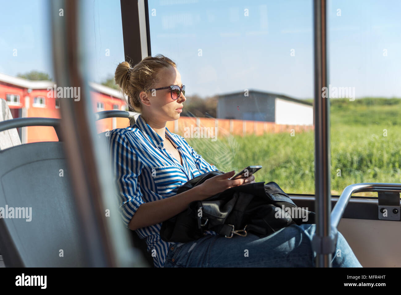 Woman driving bus hi-res stock photography and images - Alamy