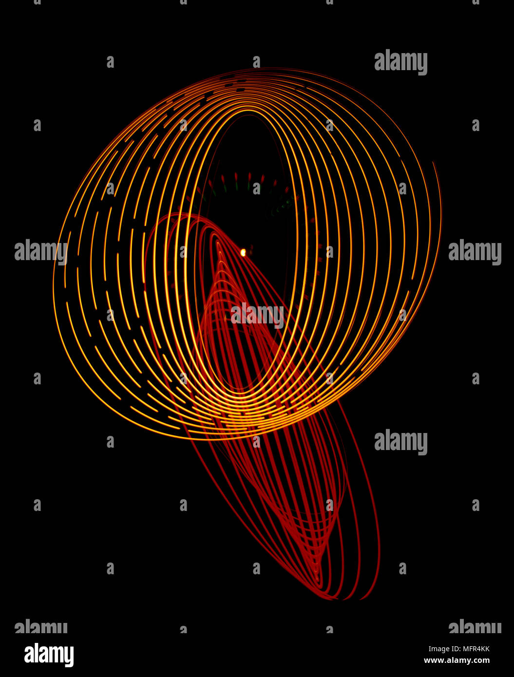 Light pendulum art. Swinging light of a small flashlight, suspended on ...