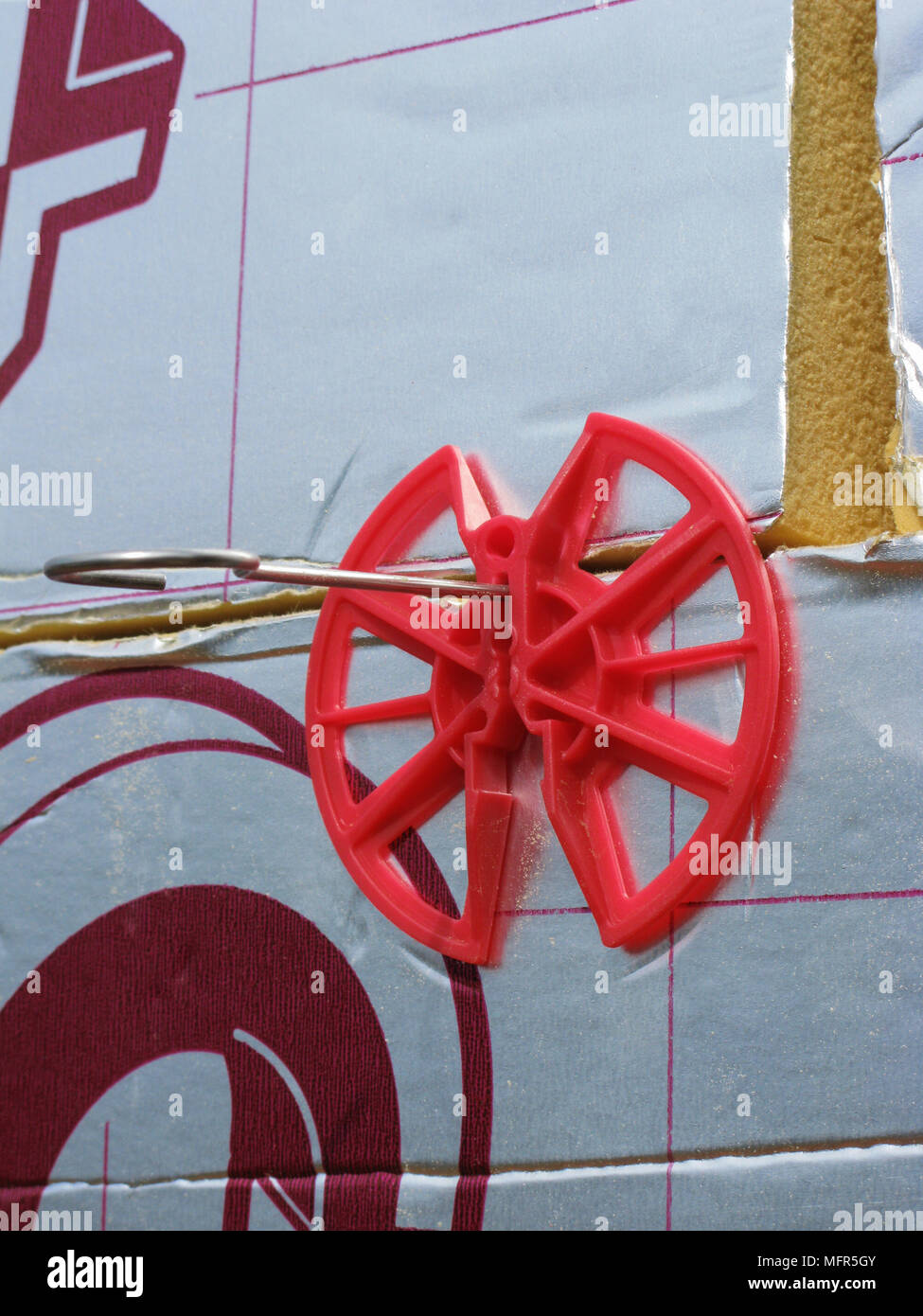 Retaining clips to hold celotex insulation boards in place in ...