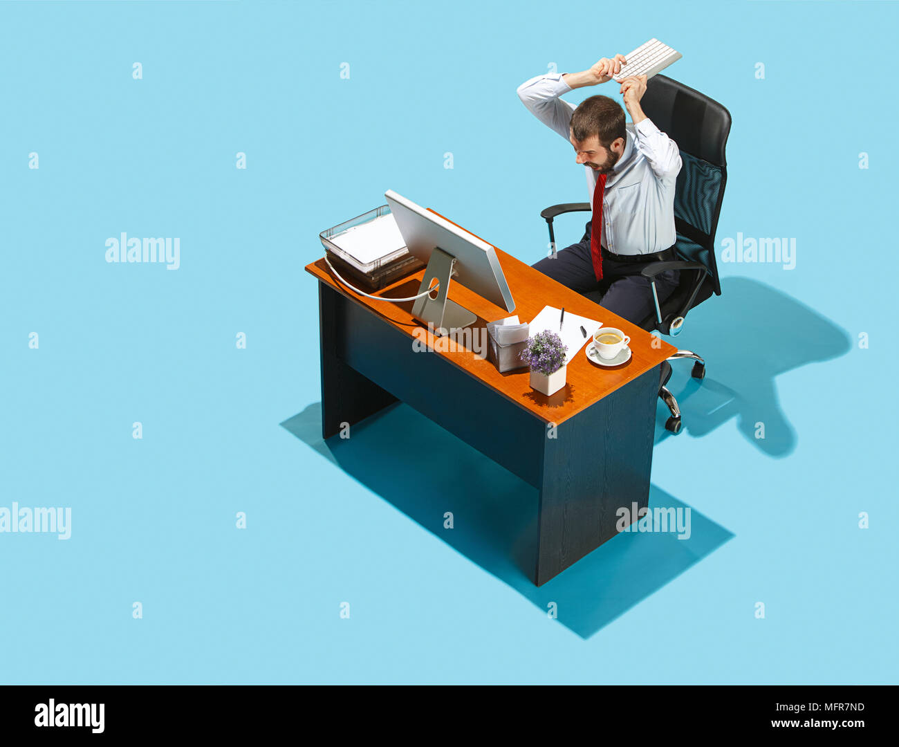 Crazy boss. Above view of businessman working on laptop. Young ...