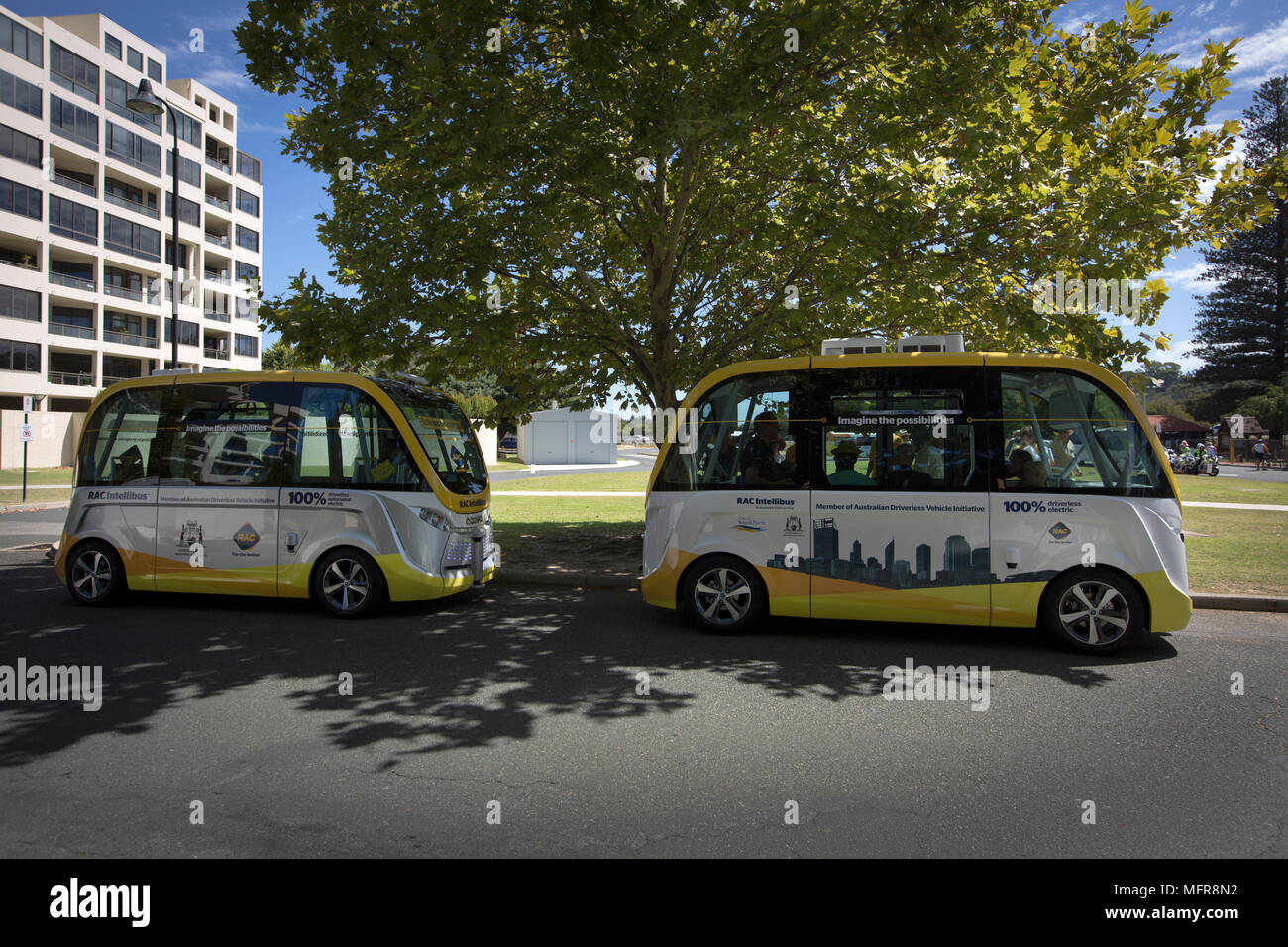Two driverless Intellibus buses undergoing a test drive on the streets ...