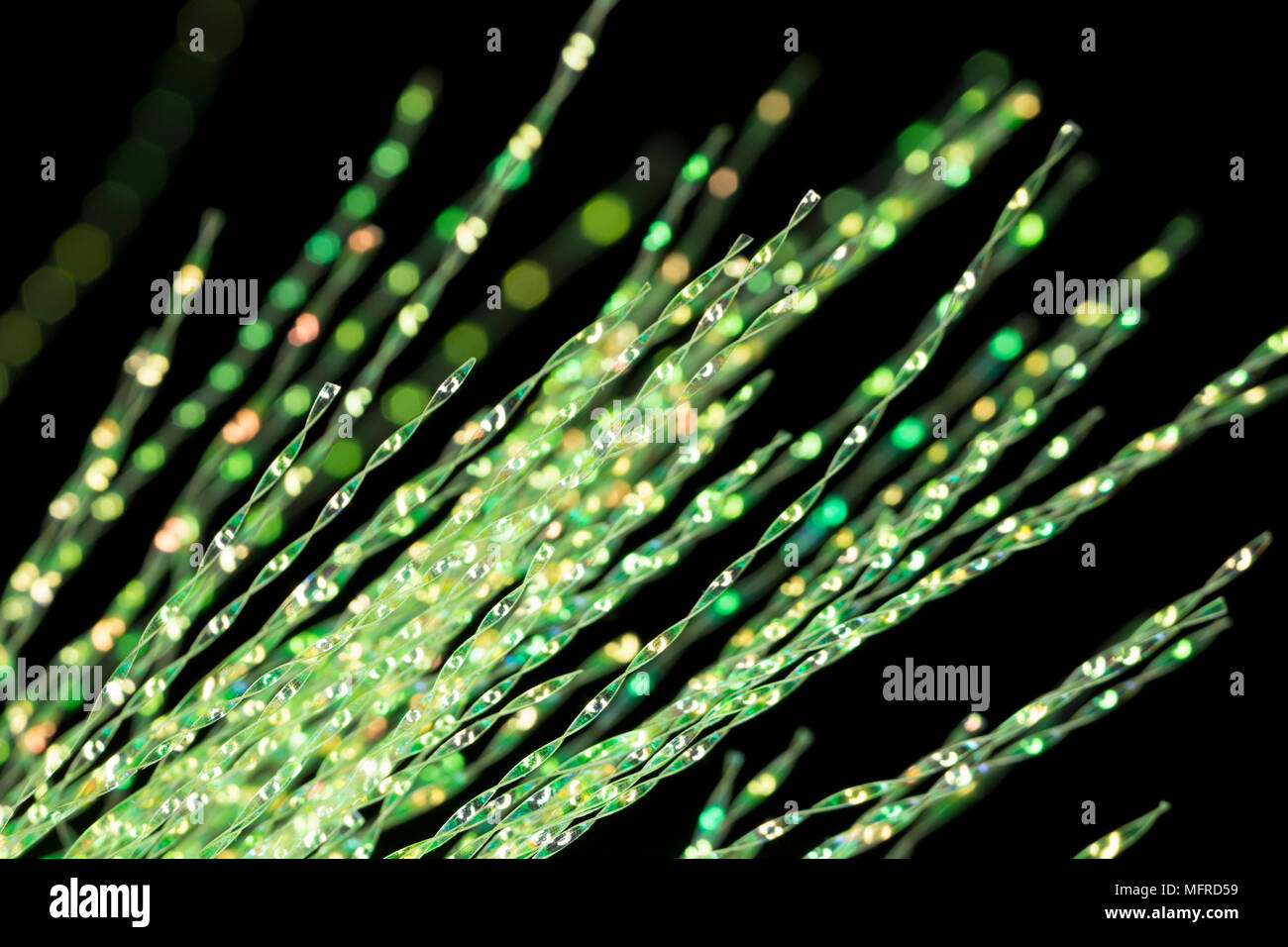 A close-up of flash material used in tying fishing flies. Black ...