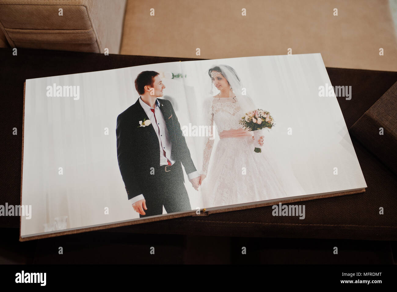 Open pages of wedding book or album Stock Photo - Alamy