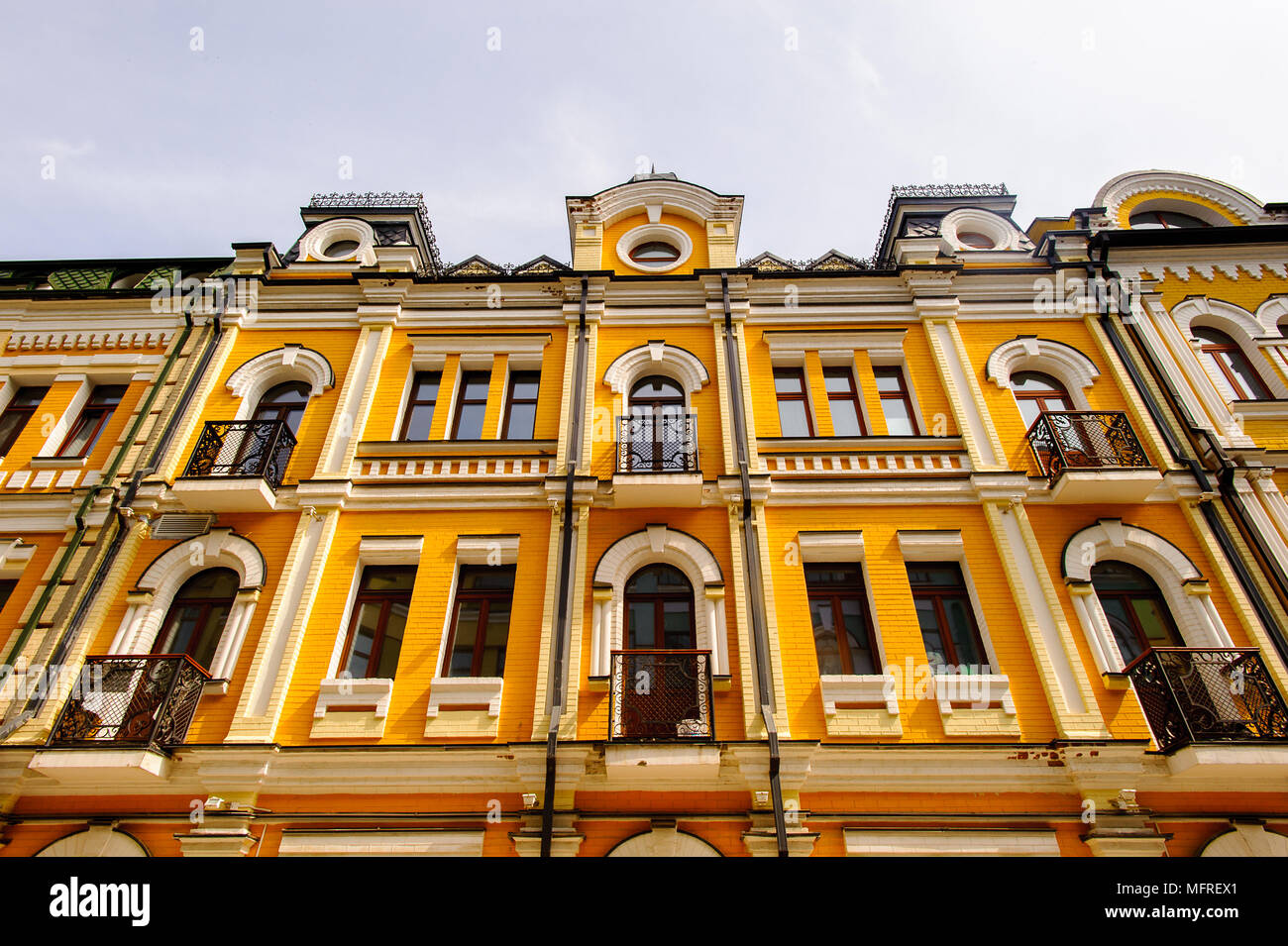 Yellow modern building Stock Photo - Alamy