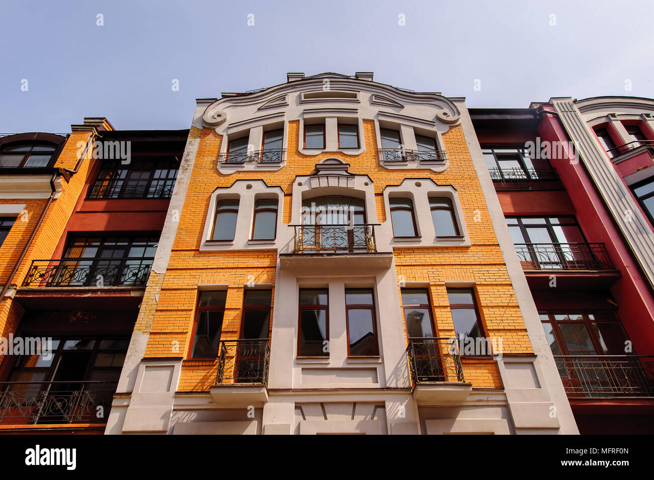 Different colored building Stock Photo - Alamy
