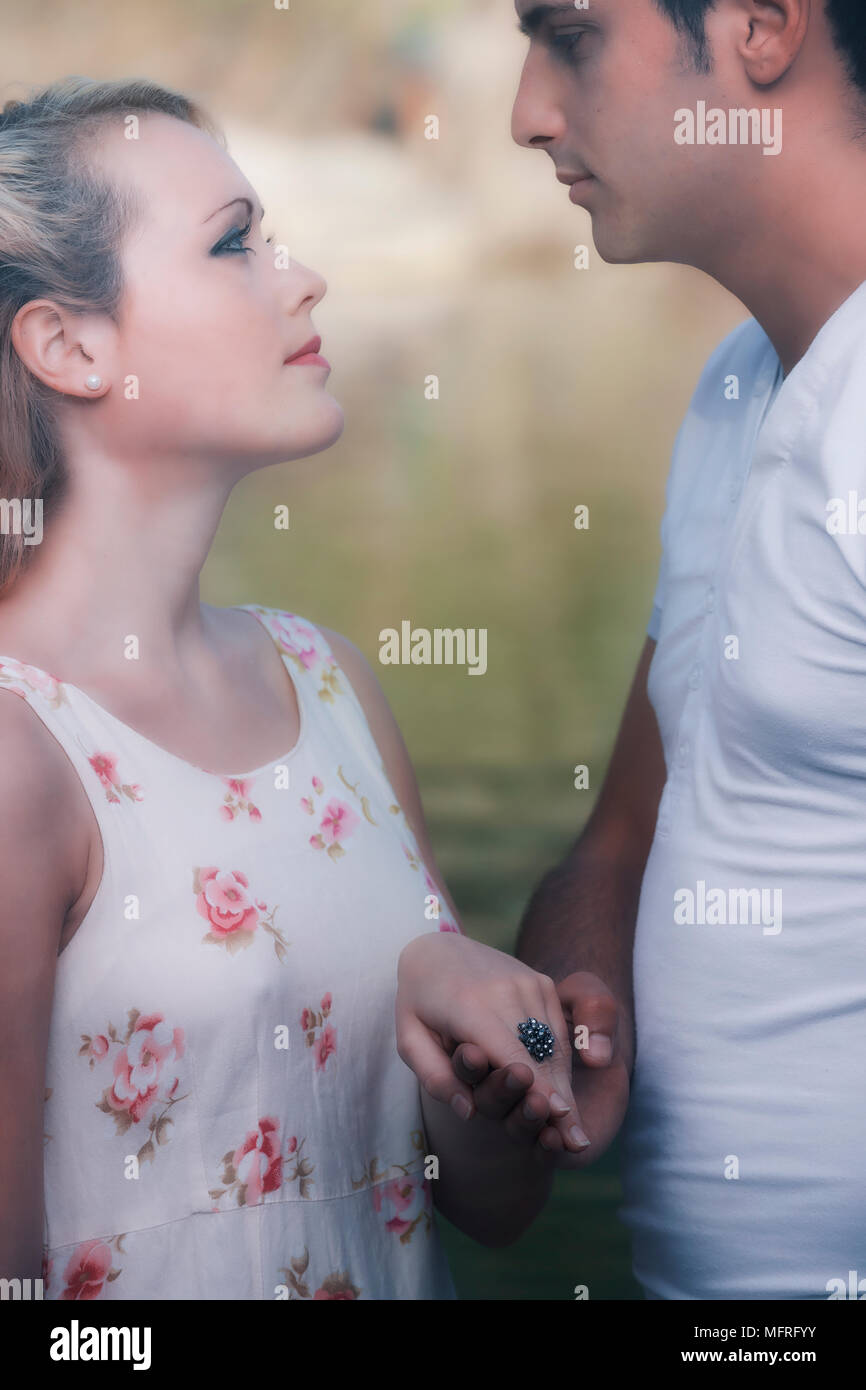 a couple hand in hand Stock Photo - Alamy
