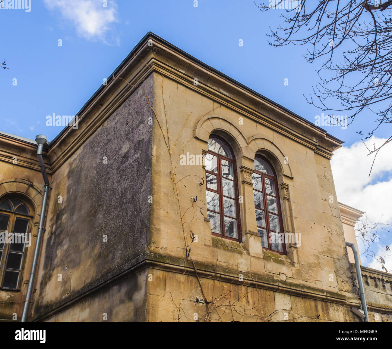 House with two windows Stock Photo - Alamy