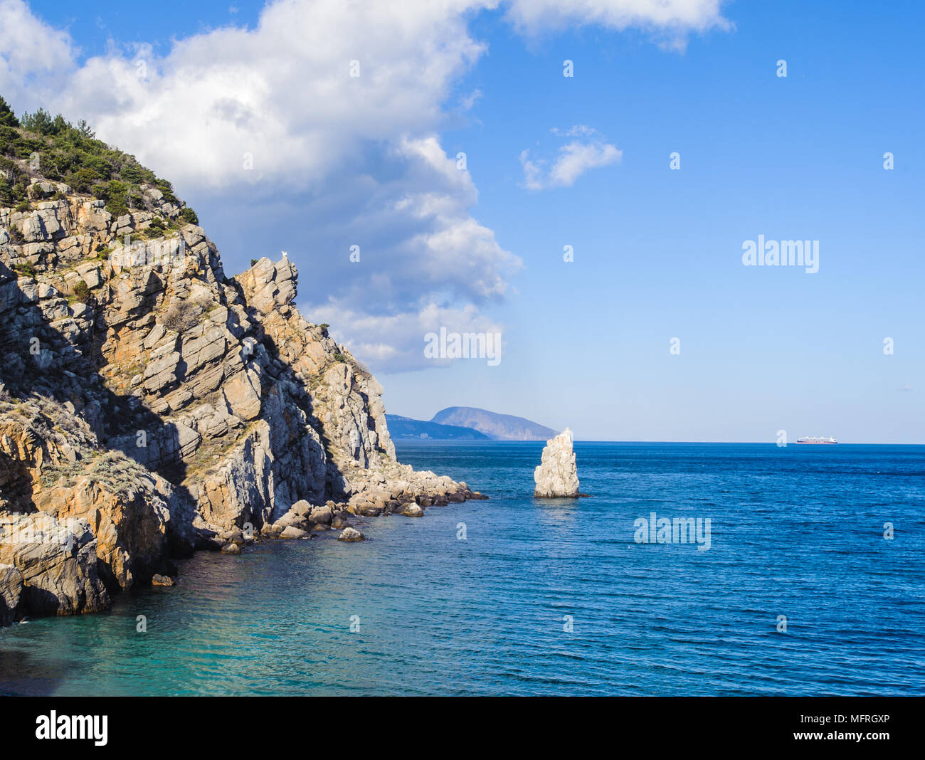 Two rocks and a sea Stock Photo - Alamy