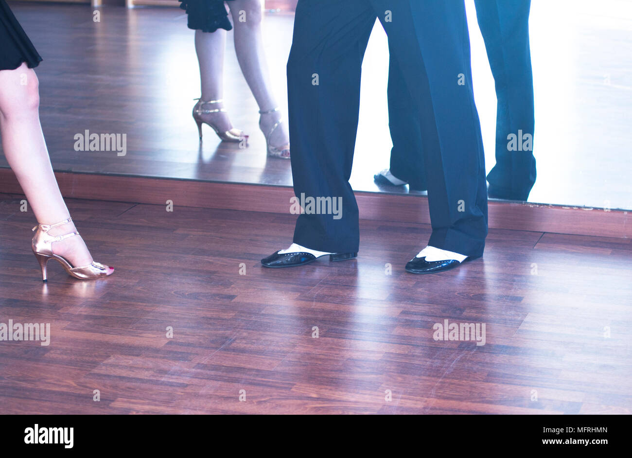Ballroom dance couple of dancers and teachers in studio school dancing ...