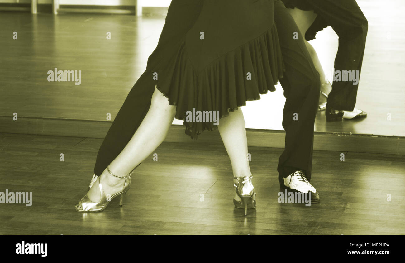 Ballroom dance couple of dancers and teachers in studio school dancing ...