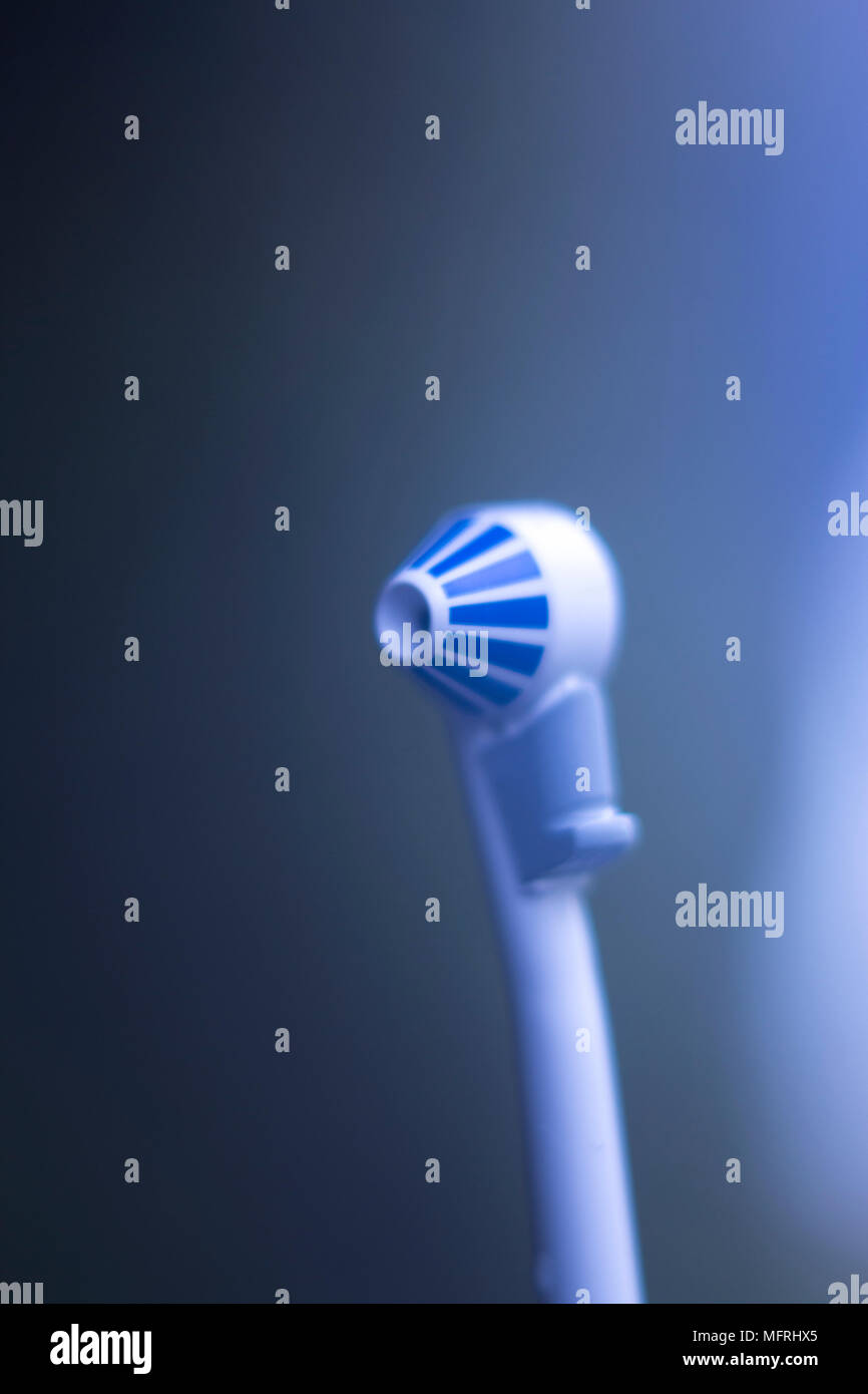 Dental water spray cleaner for interdental hygiene Stock Photo - Alamy