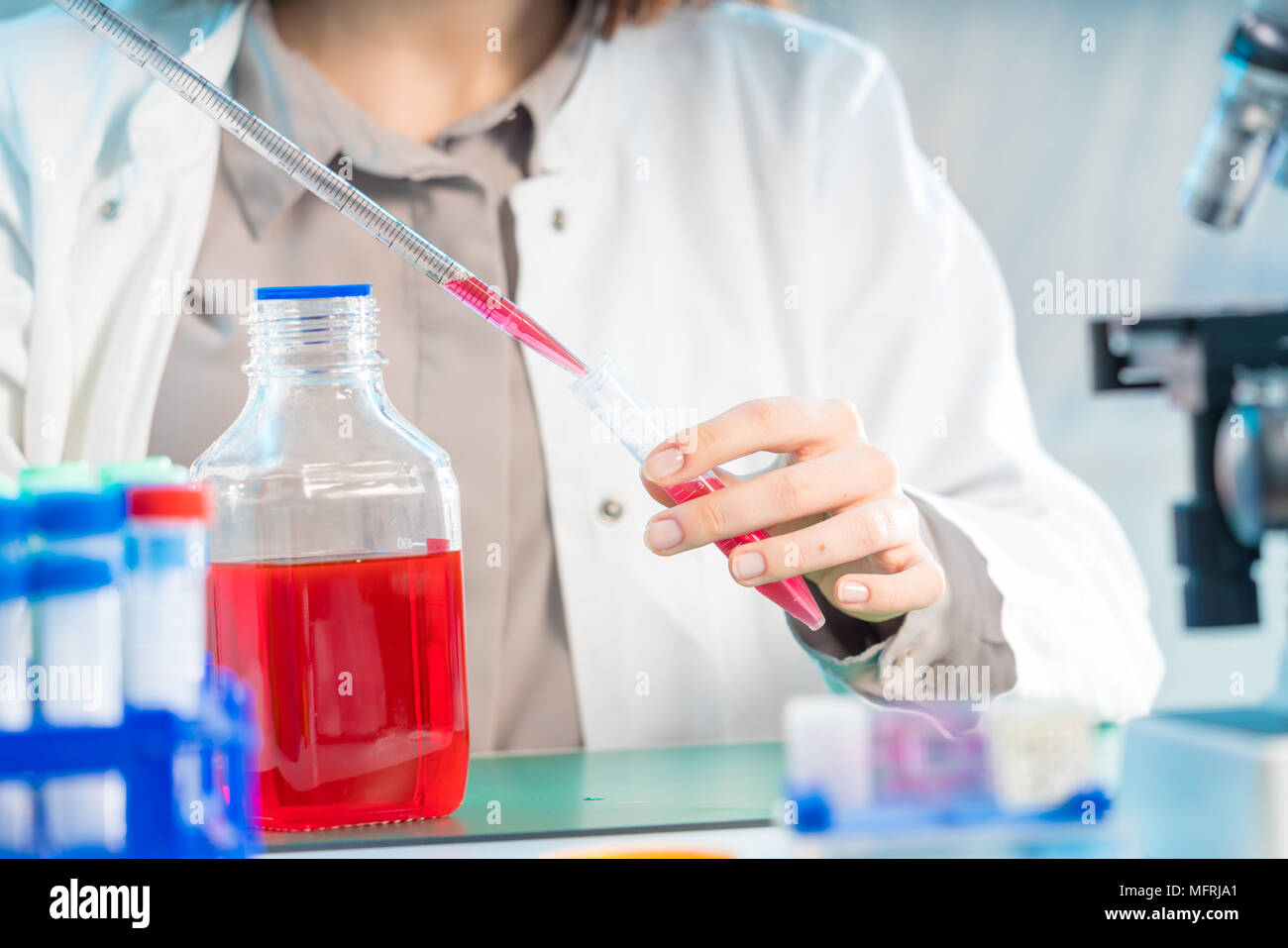 Chemical laboratory scientist woman working with pipette Stock Photo ...