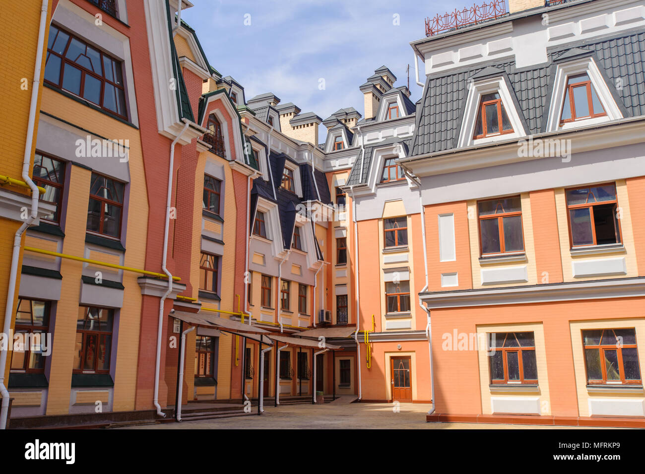 Different colored building Stock Photo - Alamy