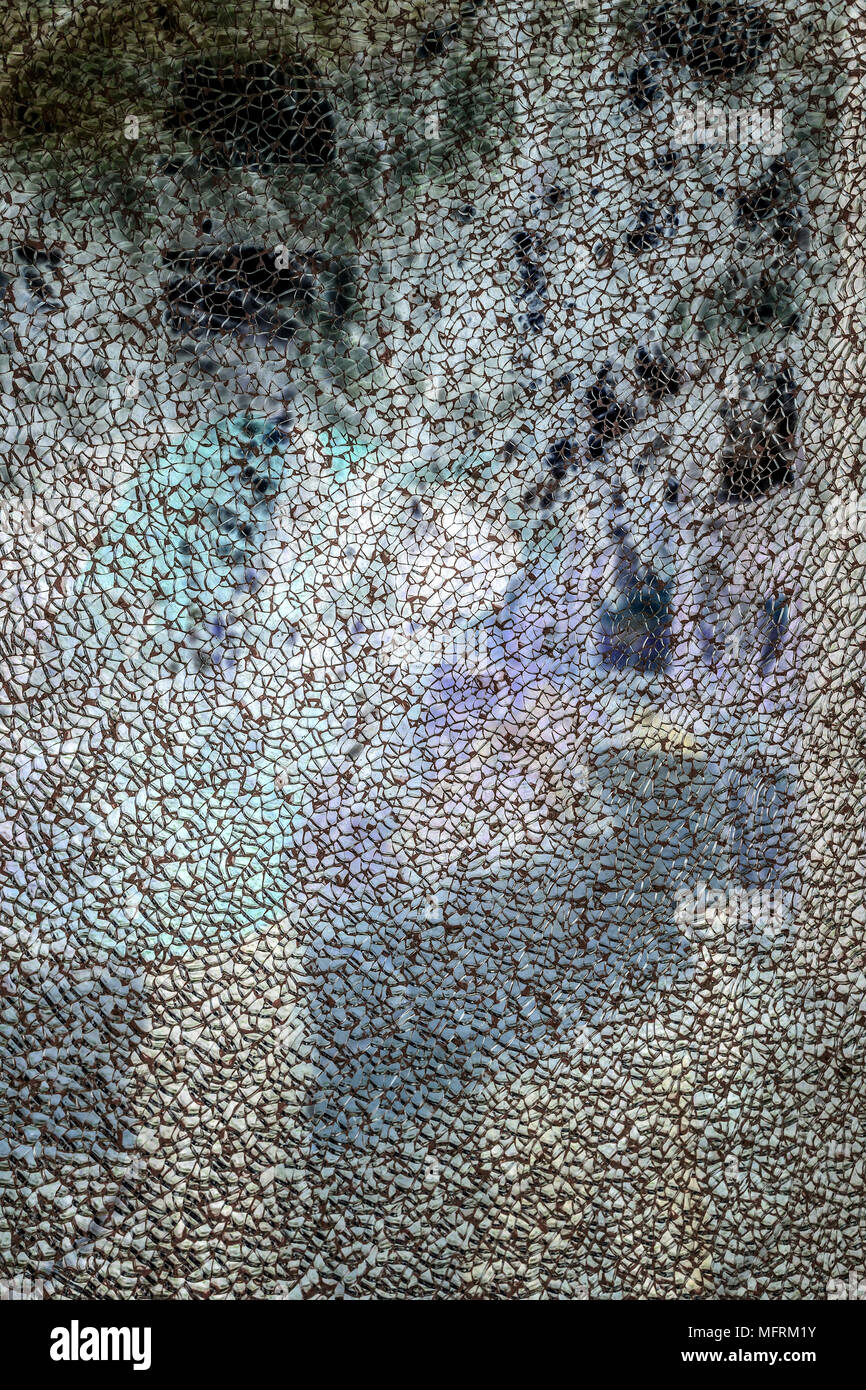 Broken tempered glass texture on a dark background Stock Photo - Alamy