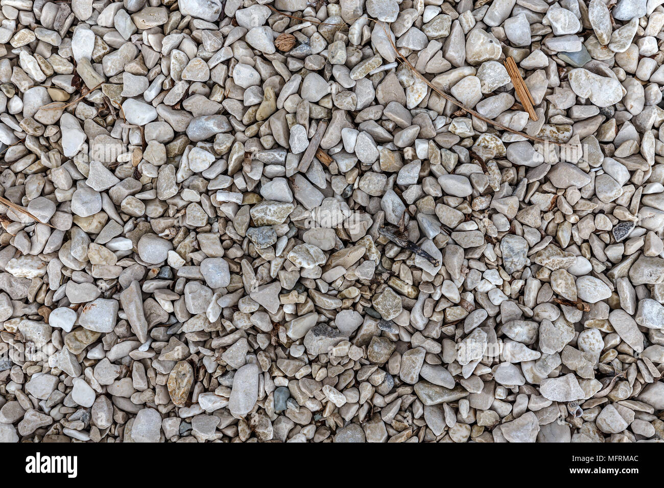 Small and smooth waterworn pebble Stock Photo - Alamy