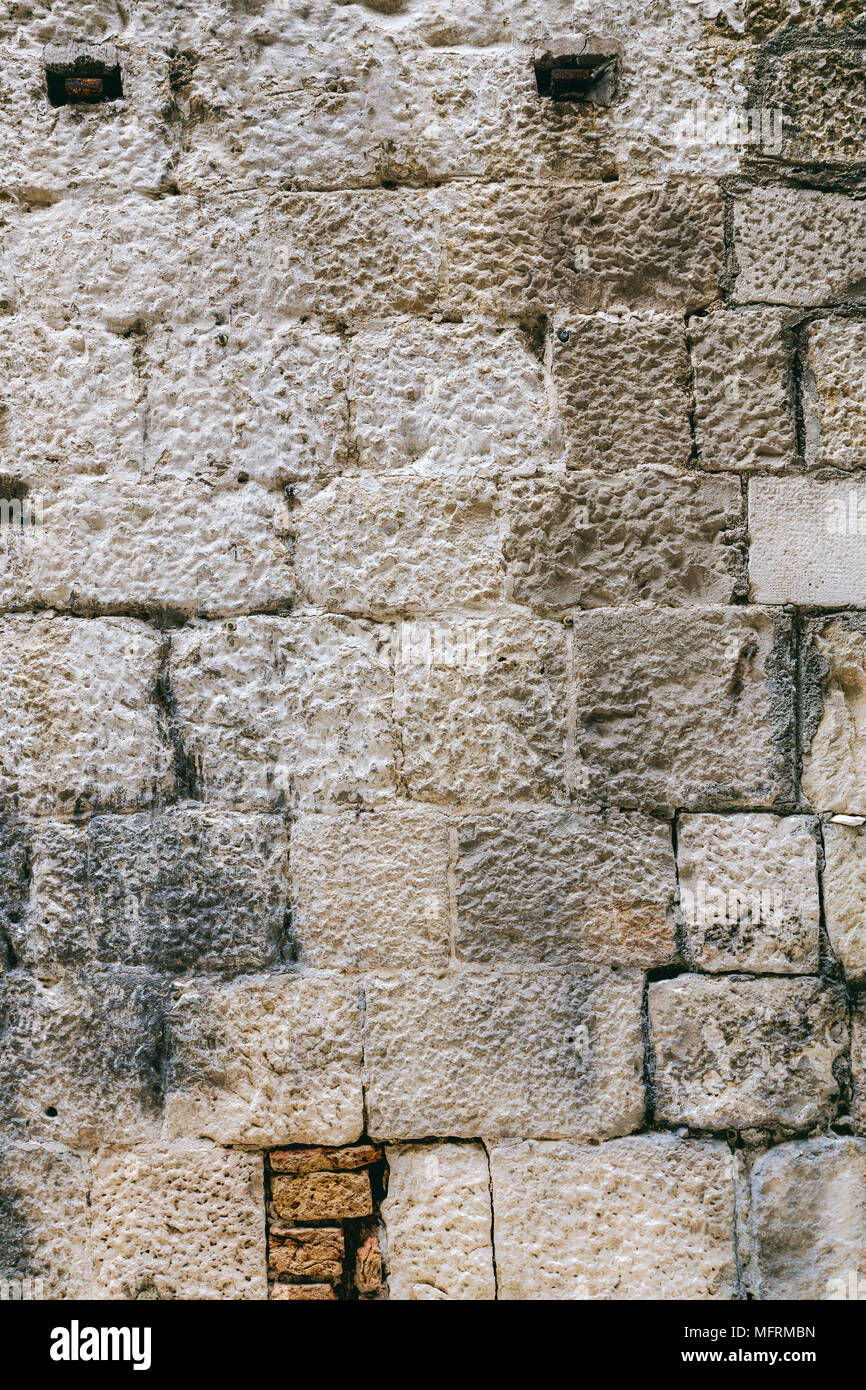 Grey cube stone wall background and texture Stock Photo - Alamy