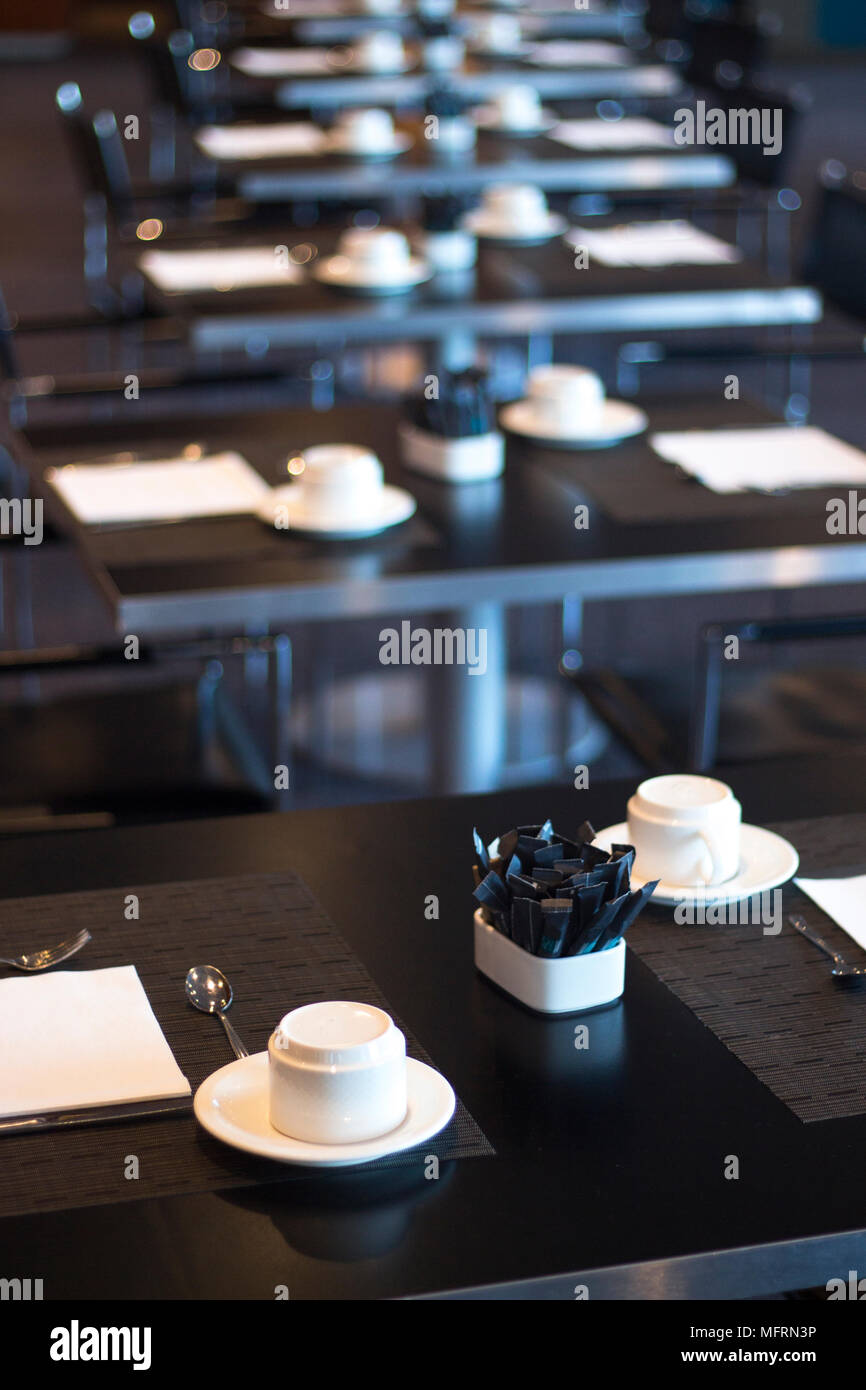 Restaurant cafe bar in luxury hotel with place settings for breakfast ...