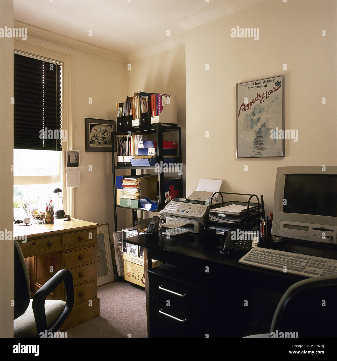 Home office with desk, computer with keyboard and other office ...