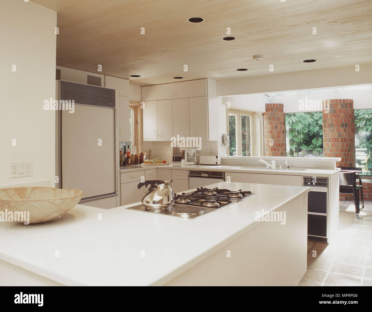Modern kitchen with white units Stock Photo - Alamy