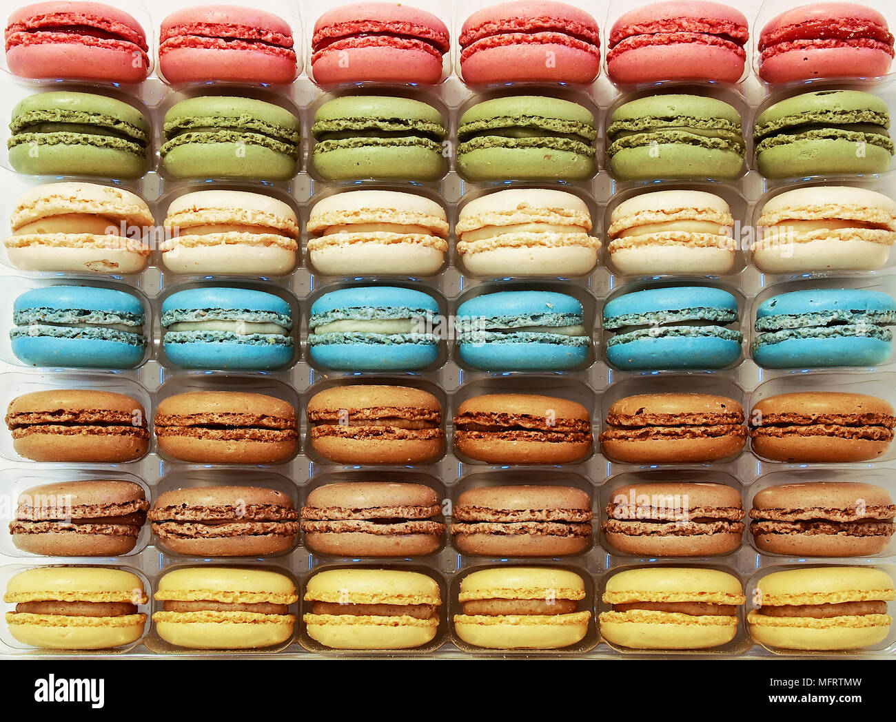 French Macaroons in plastic tray Stock Photo - Alamy