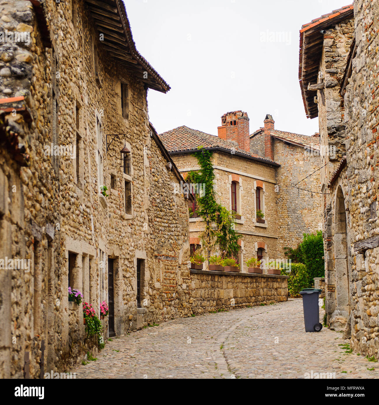 Narrow street in Perouges, France, a medieval walled town, a popular ...