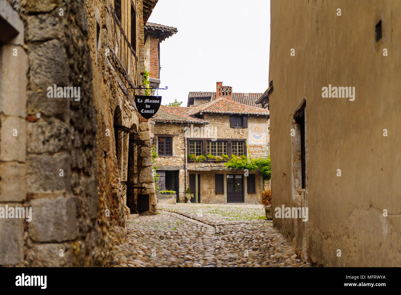 Narrow street in Perouges, France, a medieval walled town, a popular ...