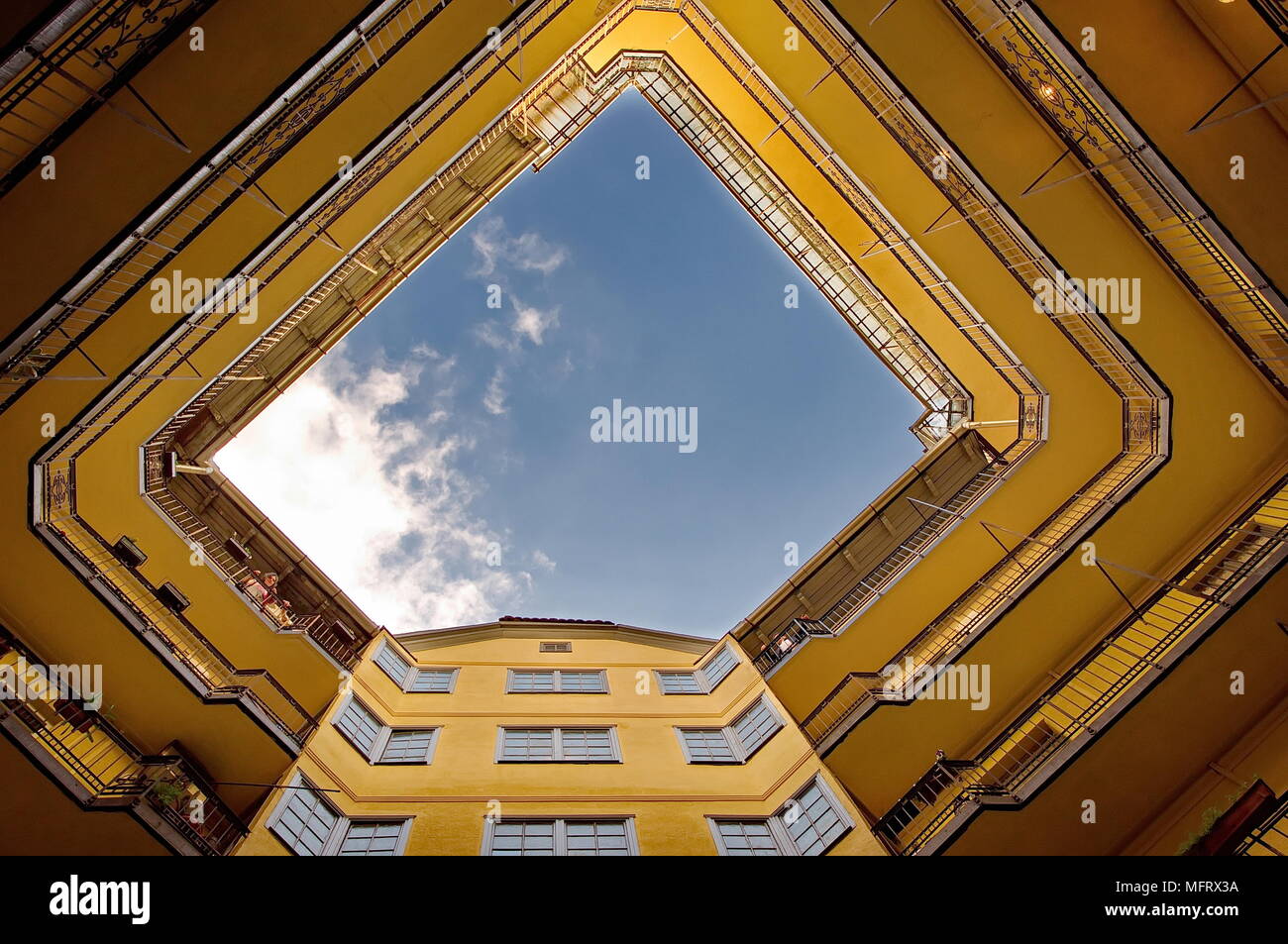 Leveles of an yellow building Stock Photo - Alamy