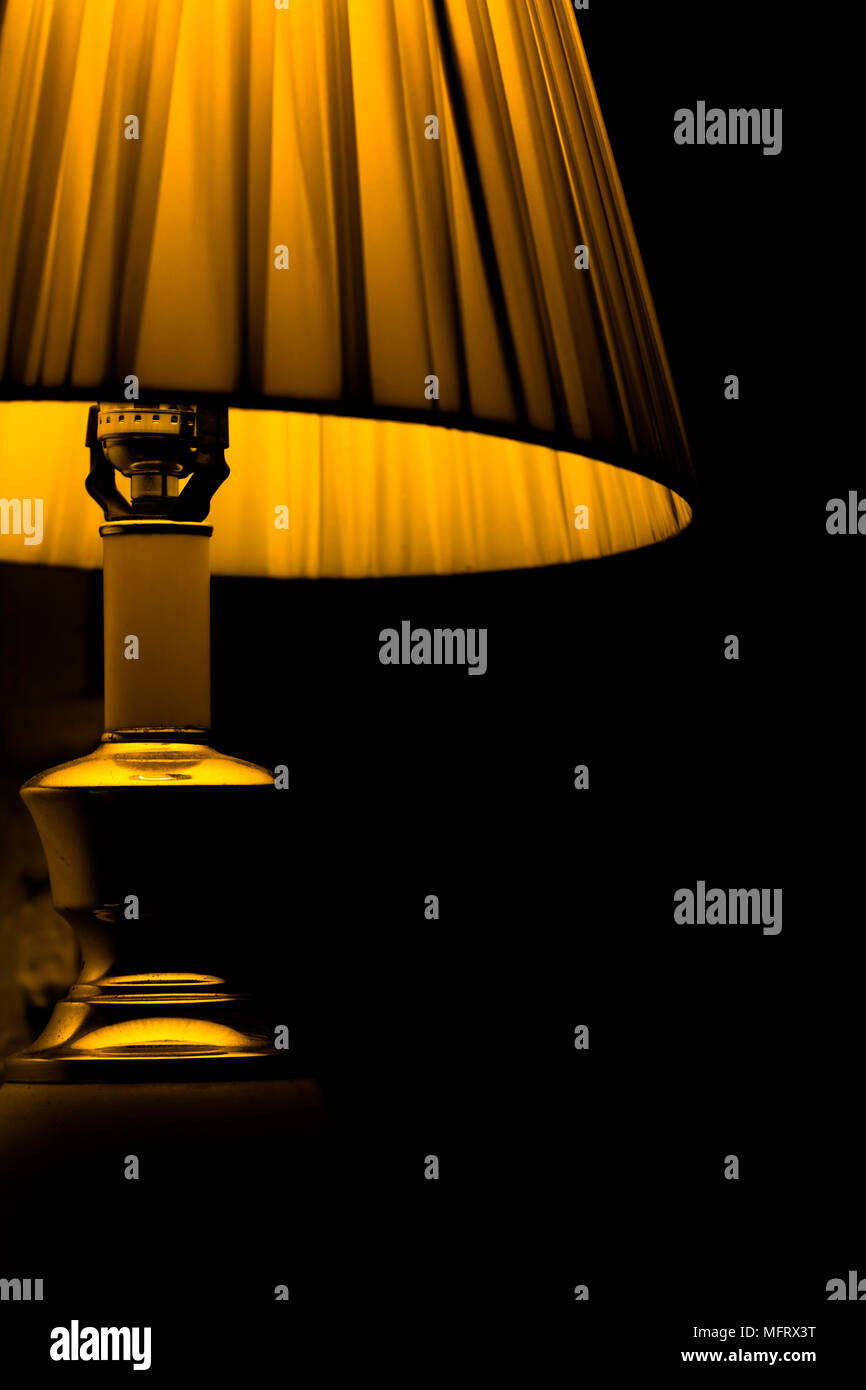 Lamp Lighting a Dark Room Stock Photo - Alamy