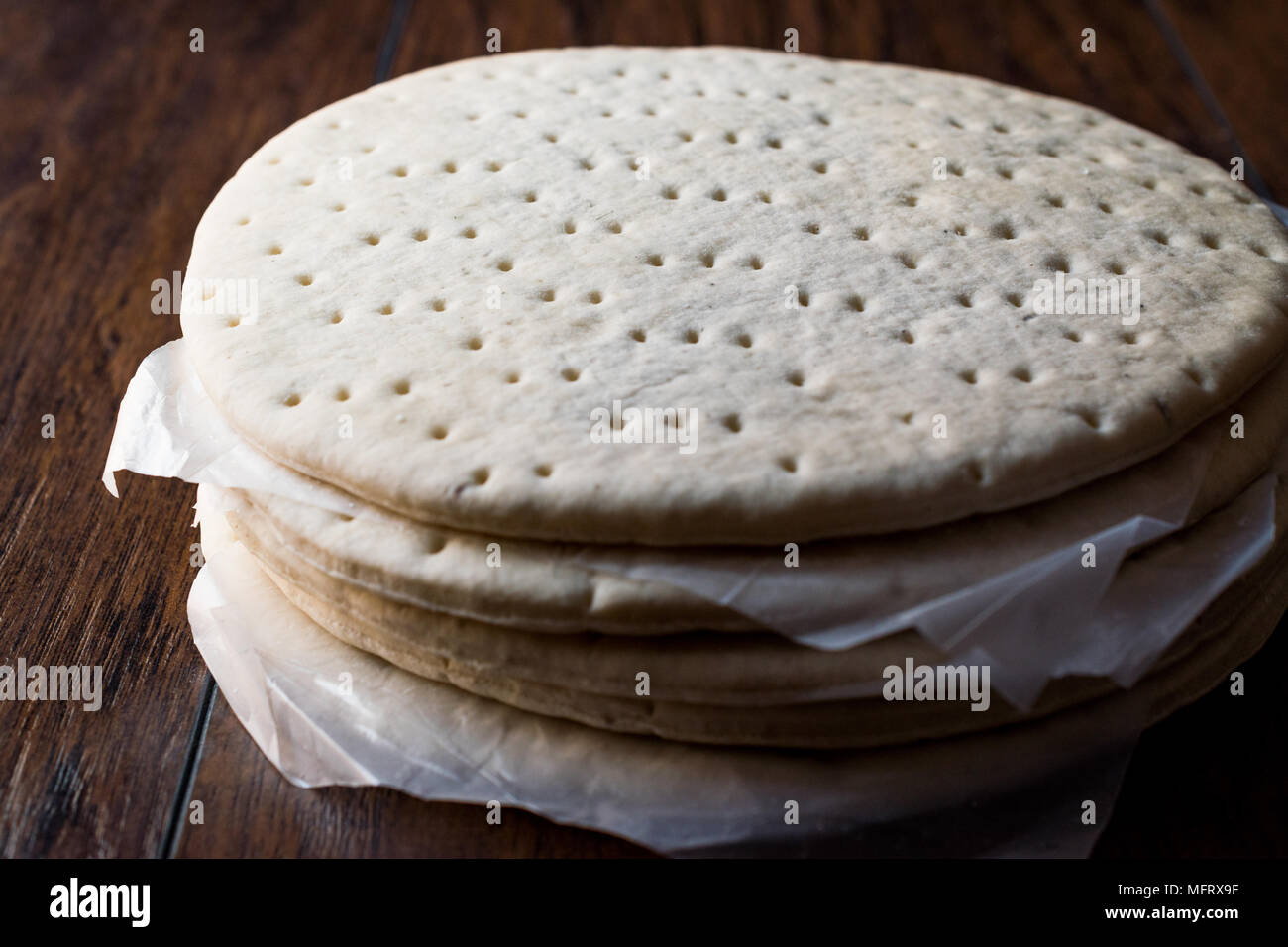 Stack of Frozen Pizza Base or Dough. Fast Food Stock Photo - Alamy