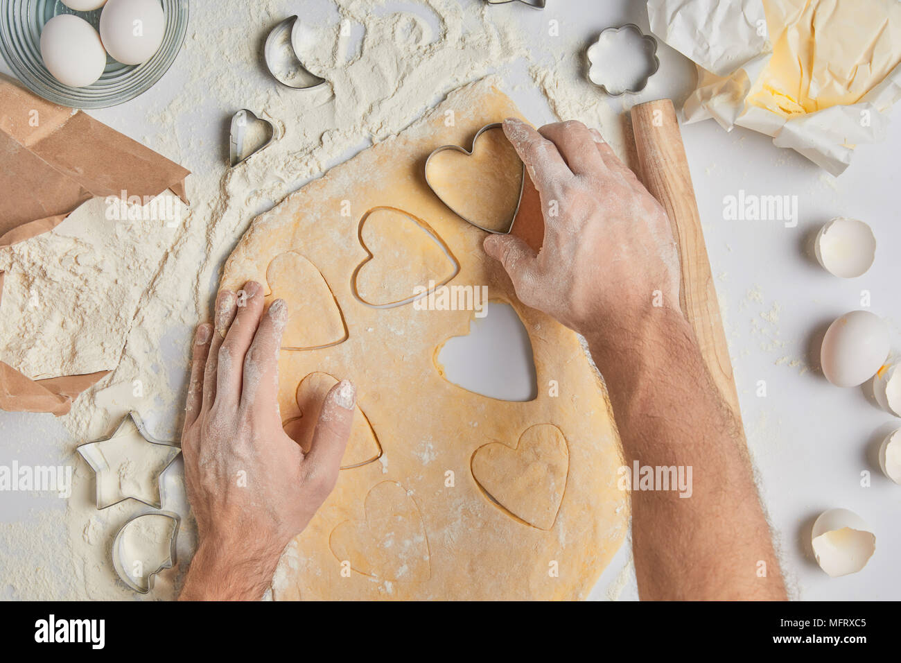 cropped image of chef preparing heart shaped cookies, valentines day ...