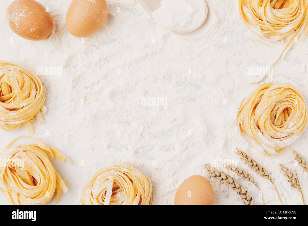 raw pasta and ingredients frame Stock Photo - Alamy