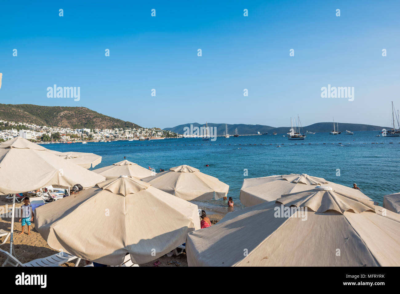 Unidentified people swim and enjoy at beach in Bodrum, Turkey.23 August ...