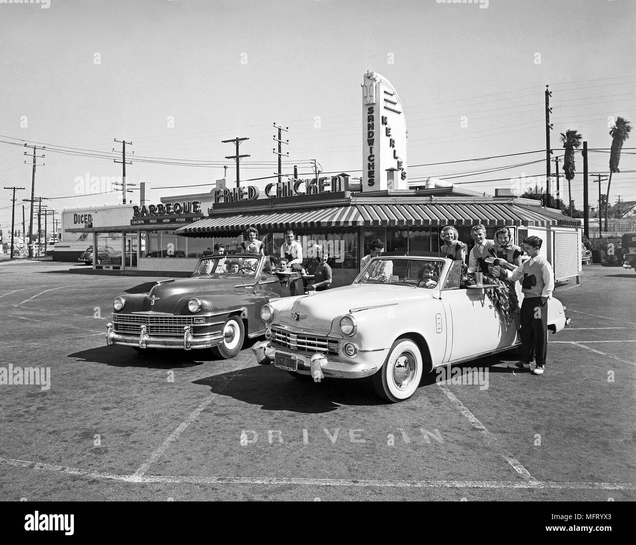 Poly High students in convertibles at Merles Drive In restaurant, Long ...
