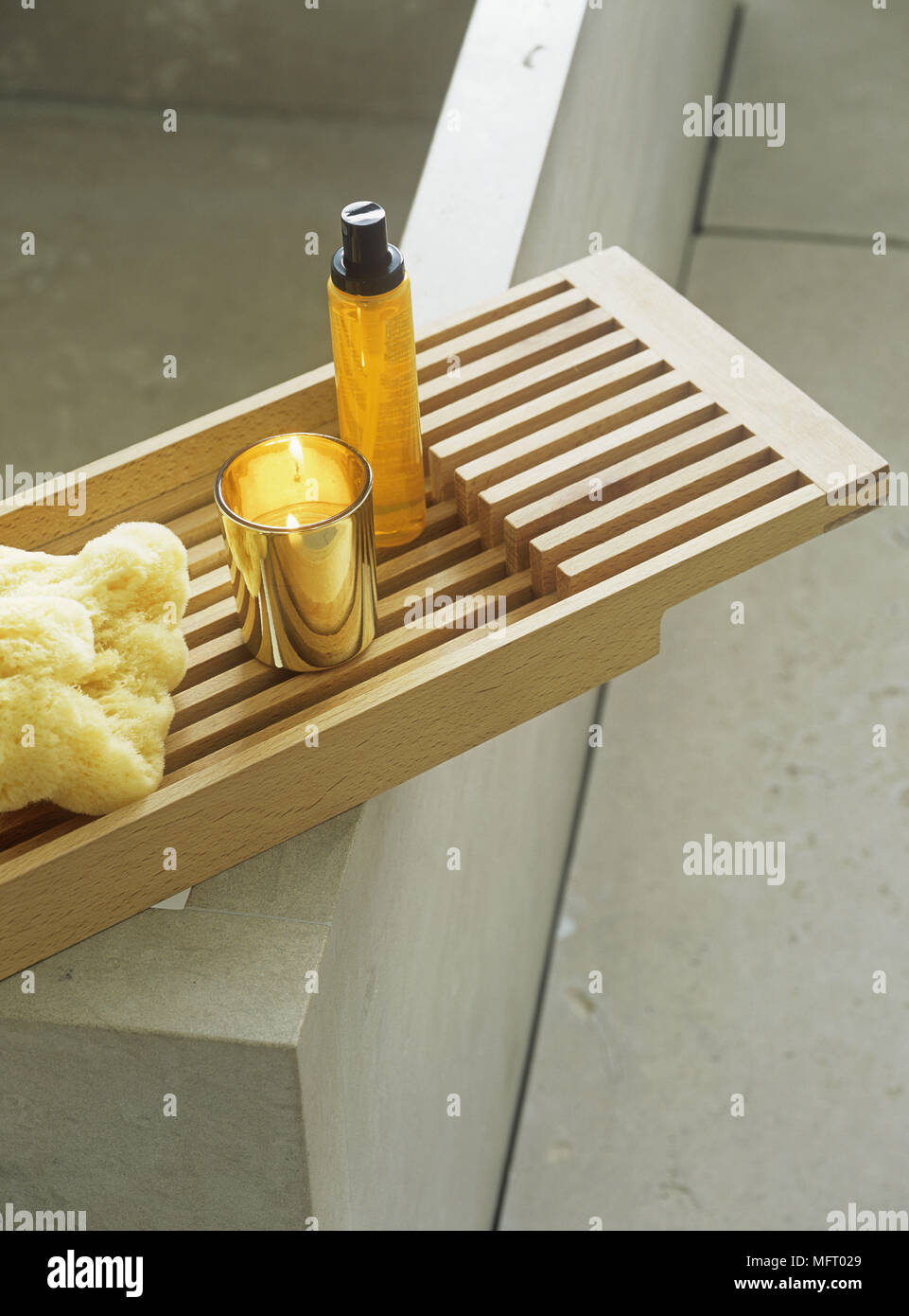 Wooden rack on grey stone with toiletries Stock Photo - Alamy