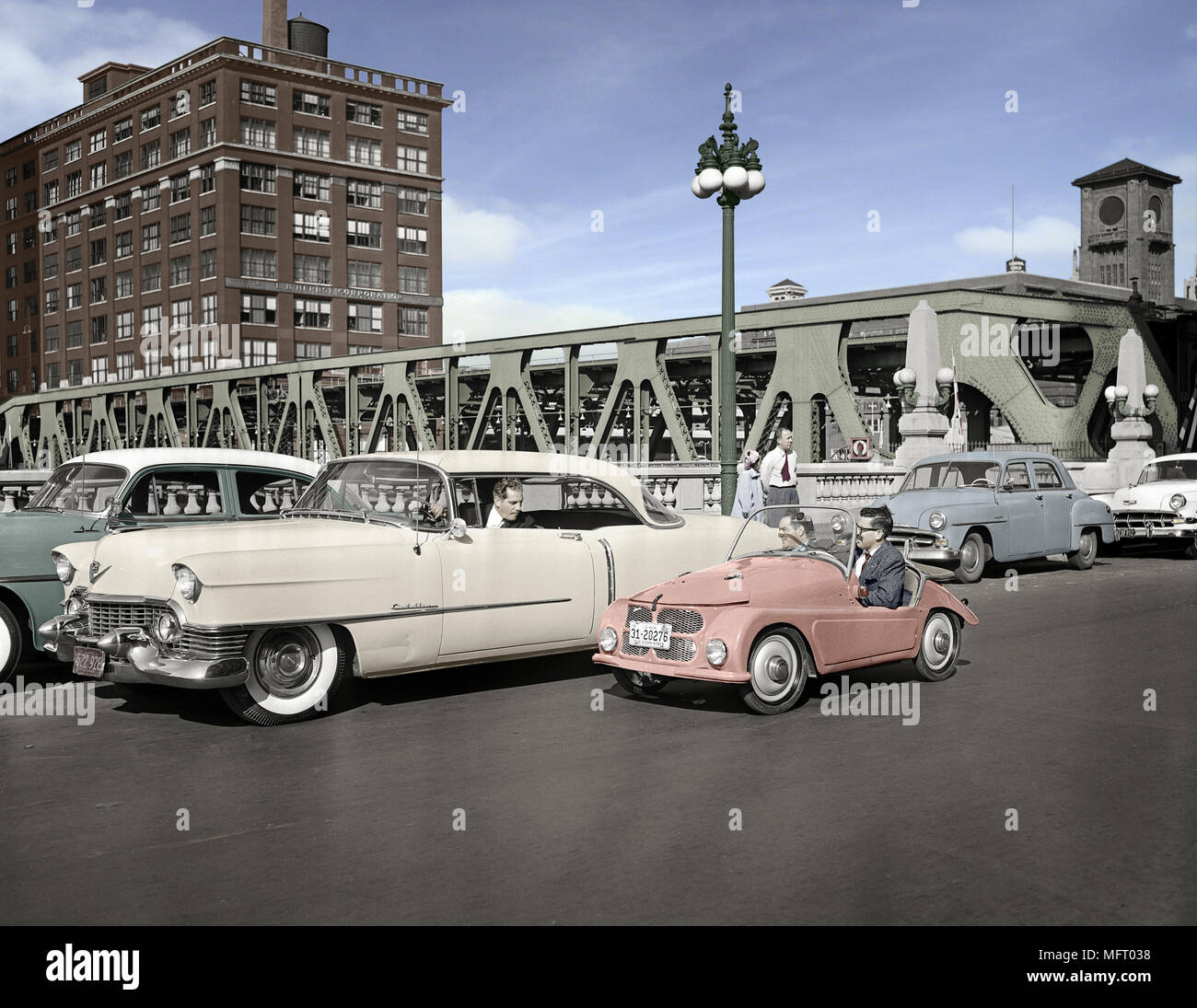 A tiny car next to a big Cadillac on Wacker Drive, Chicago, Illinois ...