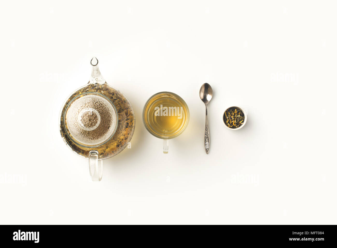 herbal tea in cup and kettle Stock Photo - Alamy