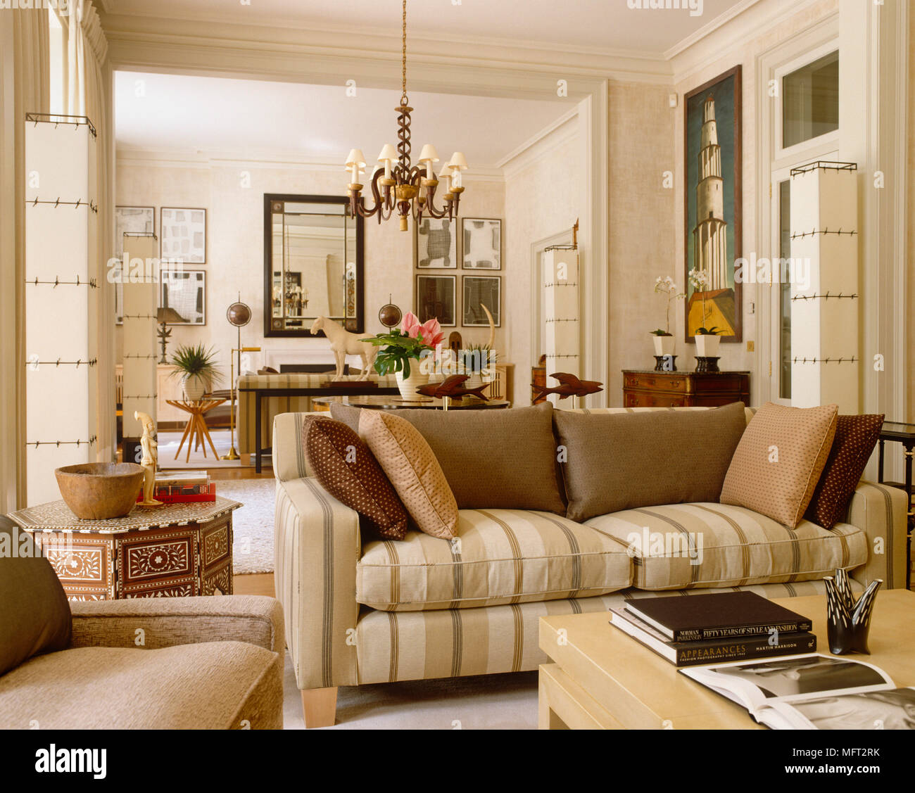 Upholstered sofa with stripe pattern separating spacious double sitting ...