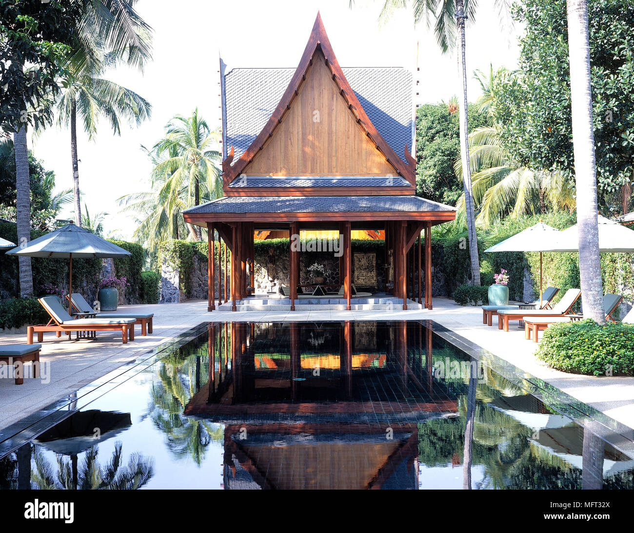 Private villa or salas in grounds of hotel resort swimming pool sun ...