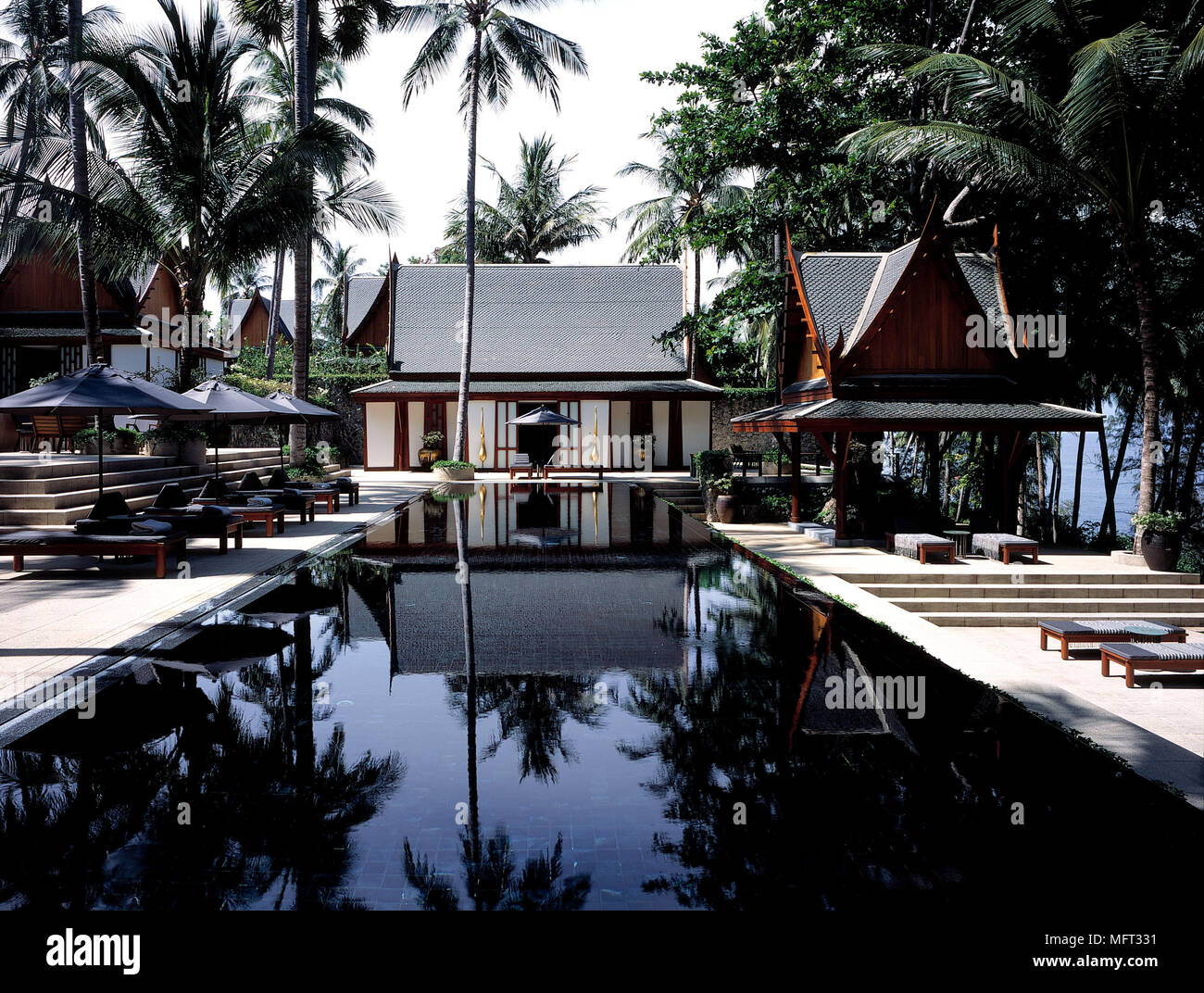 Private villa or salas in grounds of hotel resort swimming pool sun ...