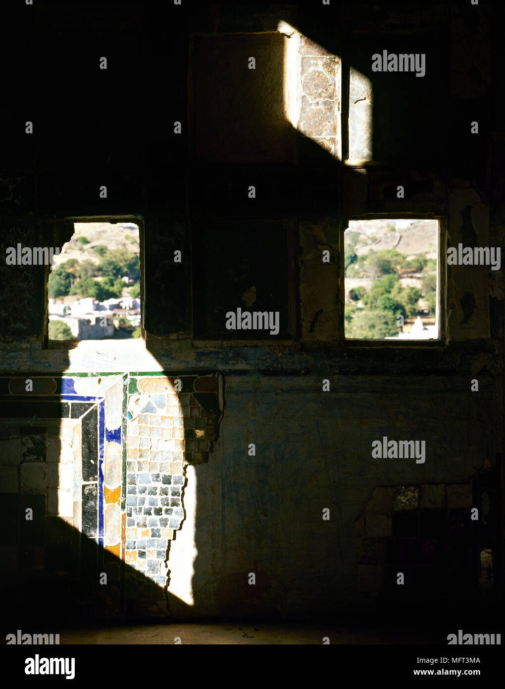 Dark room window mosaic tiled wall interiors detail Stock Photo - Alamy