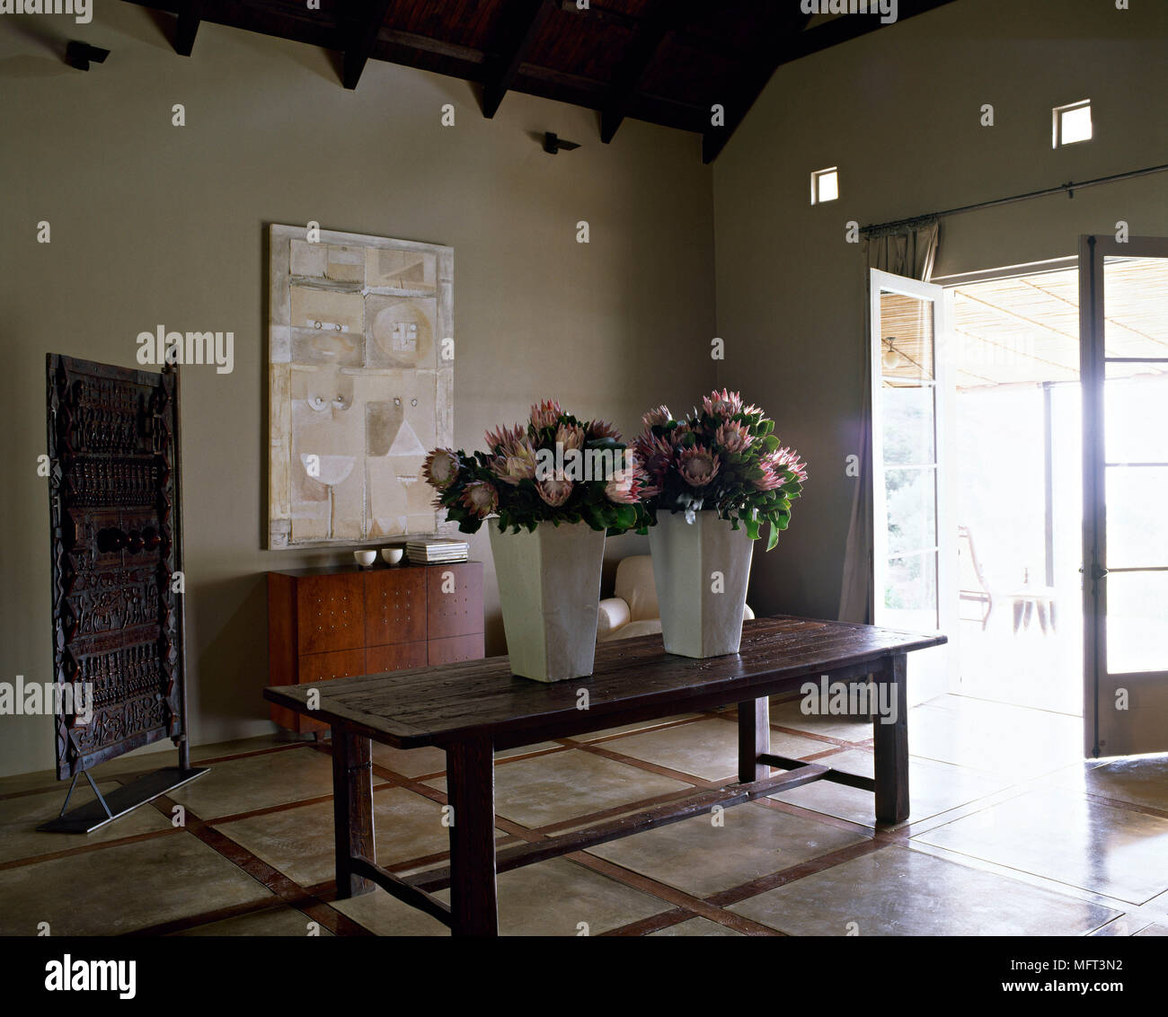 Country hallway wooden table double doors open interiors halls hallways ...