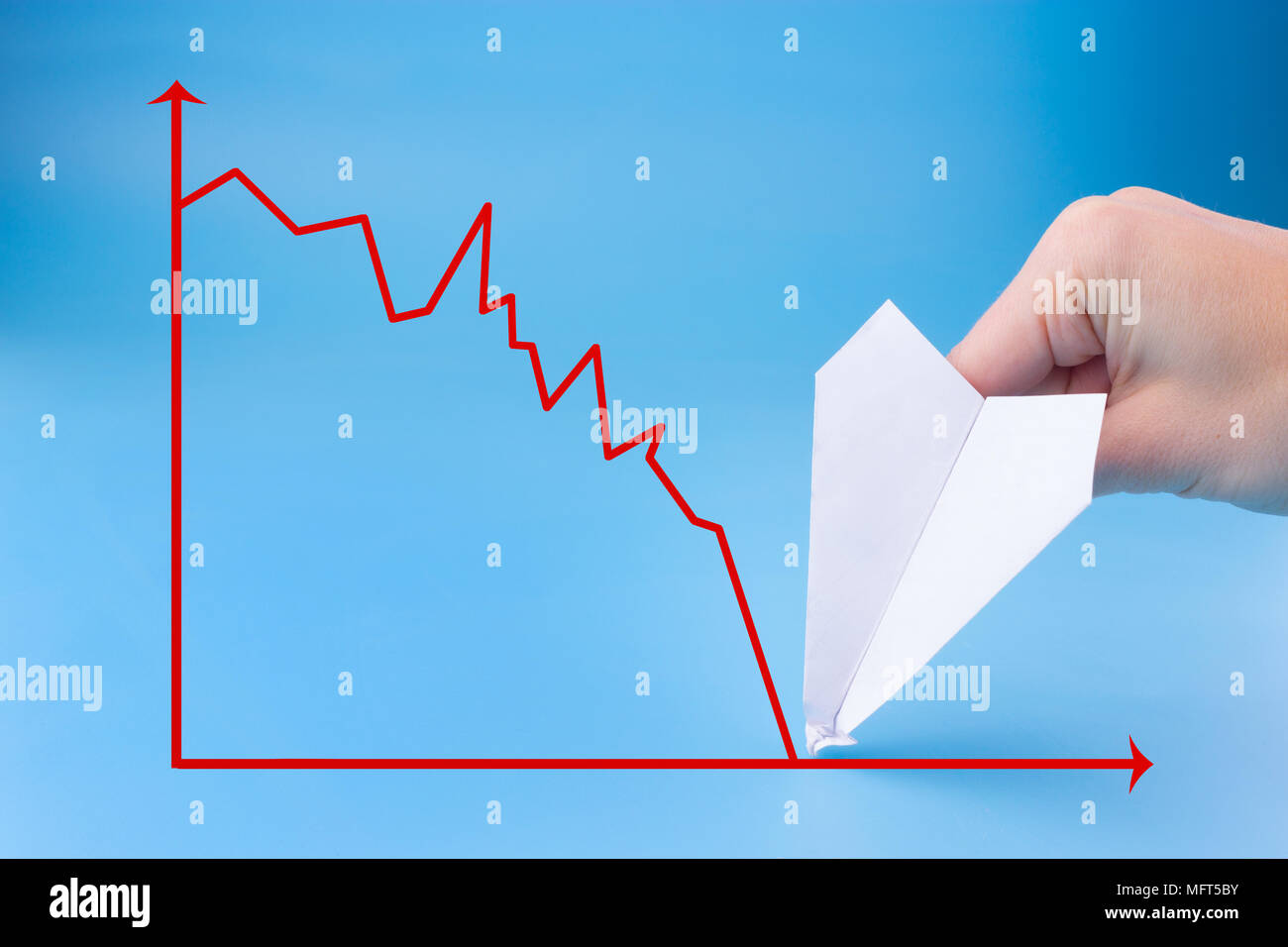 graph going down behind the plane crash Stock Photo - Alamy
