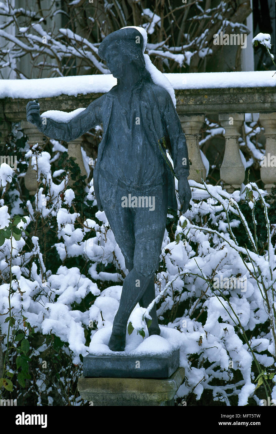 Crowe Hall, snow covered garden statue Stock Photo - Alamy