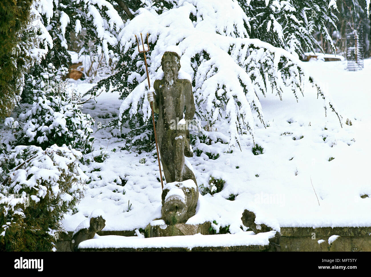 Crowe Hall, snow covered garden statue Stock Photo - Alamy