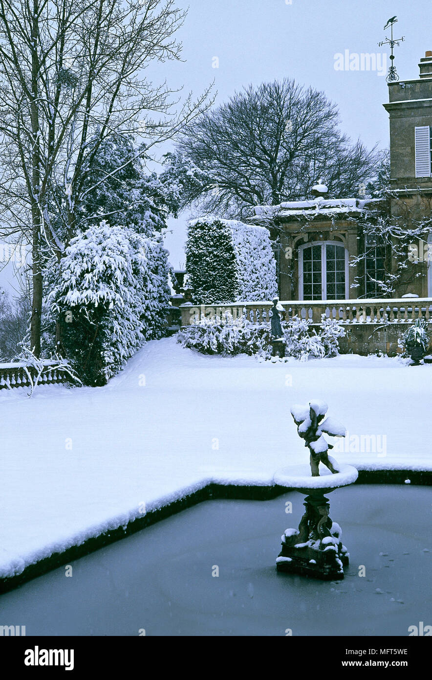Crowe Hall, Georgian country house with frozen garden fountain Stock ...