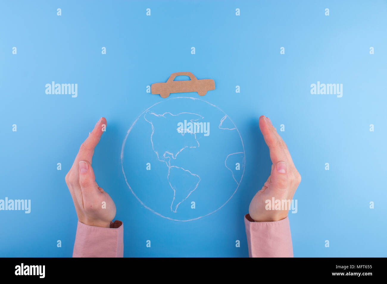 paper lorry on the earth planet. delivery concept Stock Photo - Alamy