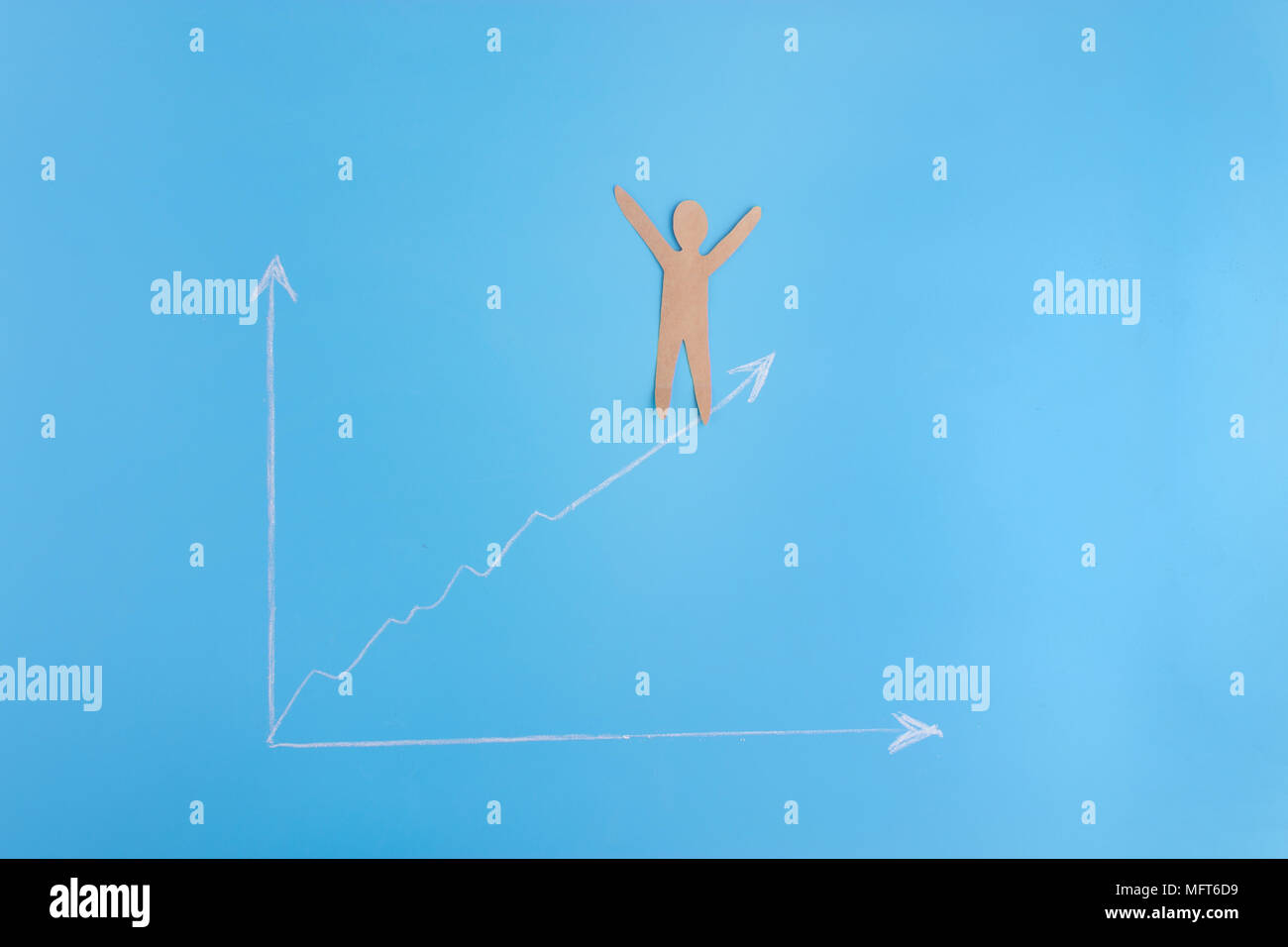 person made from paper stand on graph. win concept Stock Photo - Alamy