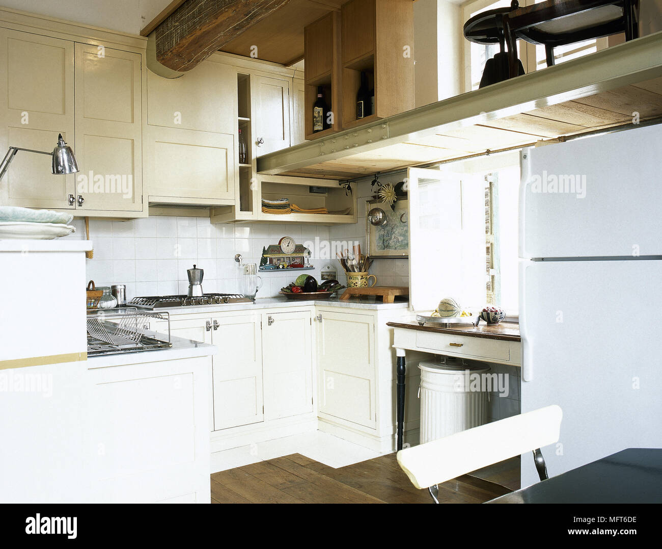 Contemporary kitchen with white fitted units Stock Photo - Alamy